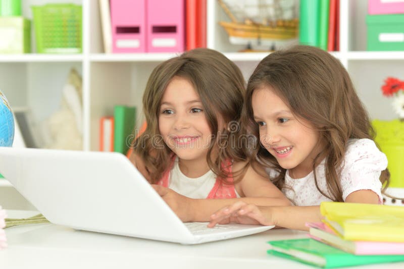 Two Cute Little Girls at Class with Laptop Stock Image - Image of ...
