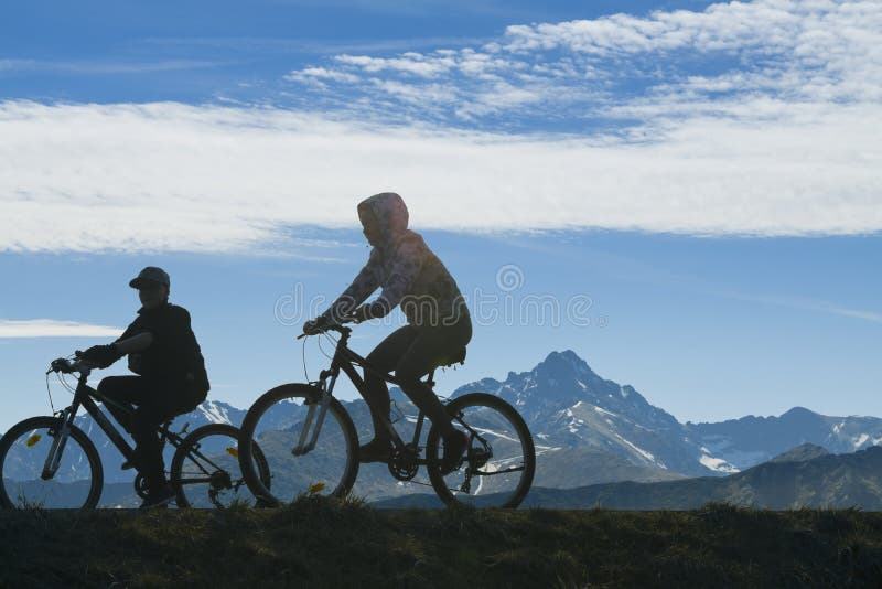 Two Cyclists Against Mountain Landscape Editorial Image - Image of ...