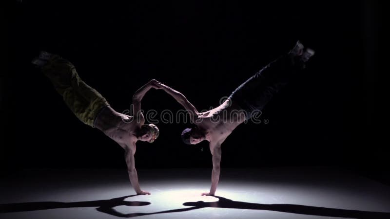 Black Shadow of Flexible Dancer Lady Performing Dance Movement. Medium ...