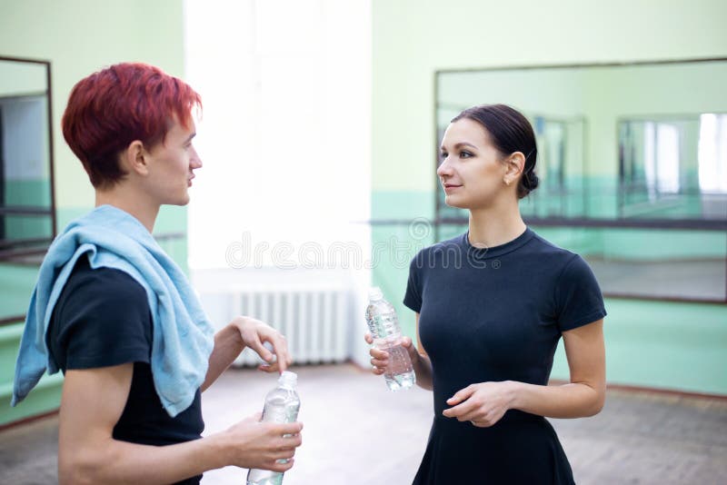 Two Dancers Resting after Hard Training Stock Photo - Image of ...