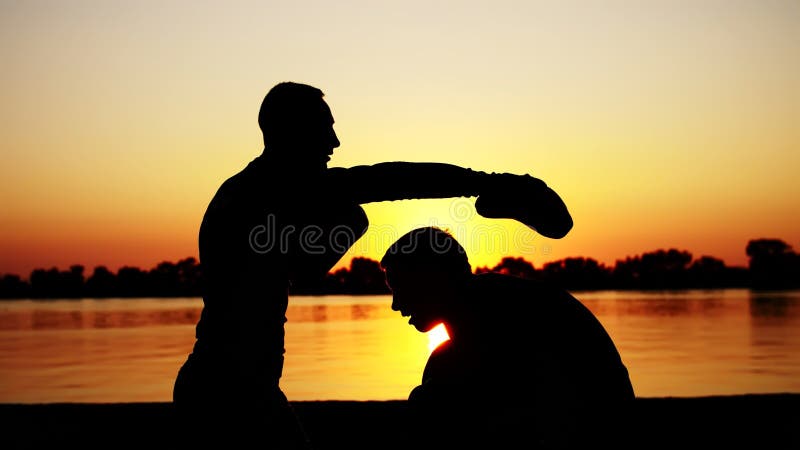 Two Dark Male Figures, at Sunrise, Against the Light, Boxing, Fighting ...