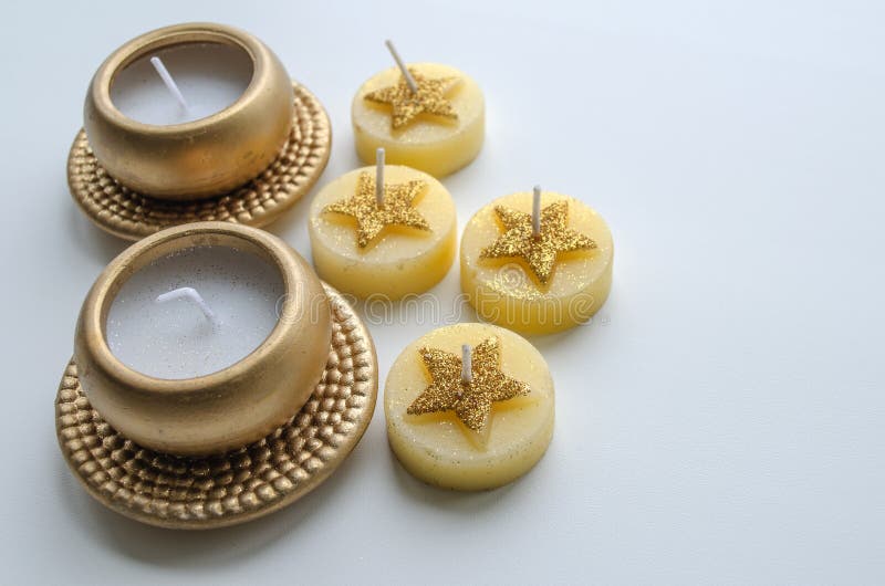 Two Decorative Candles in Gold Color and Four Candles with Star Pattern ...