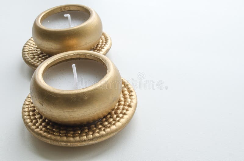 Two Decorative Candles in Gold Color Stock Image - Image of heat ...