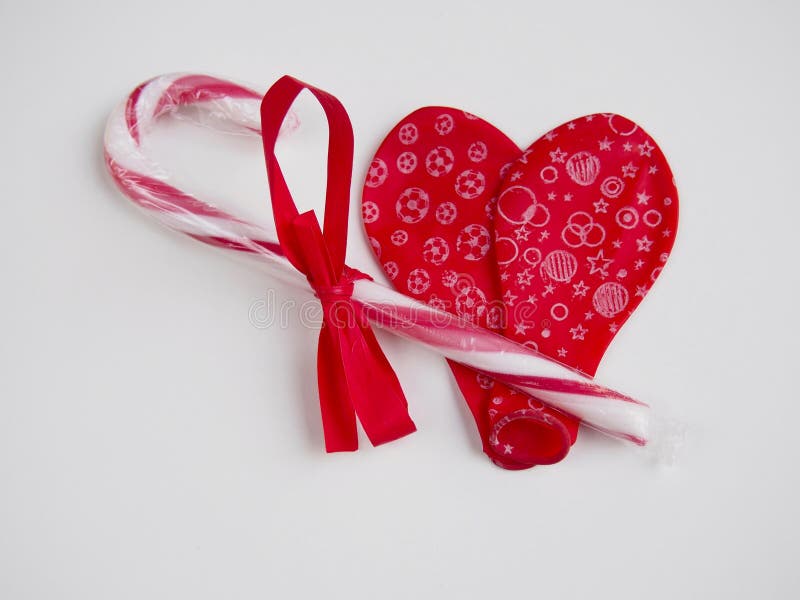 Two Deflated Red Balloon Forming a Heart Stock Photo - Image of color ...