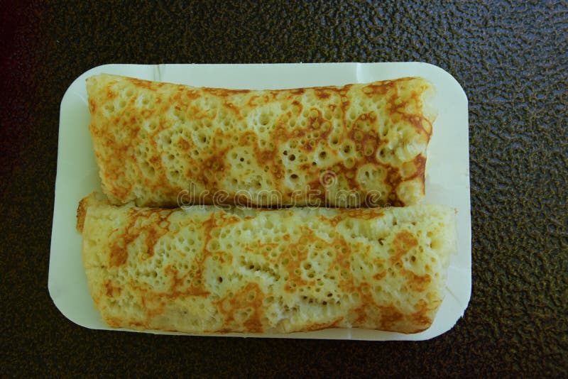 Two Delicious Pancakes on a Disposable Paper Plate are on the Table ...