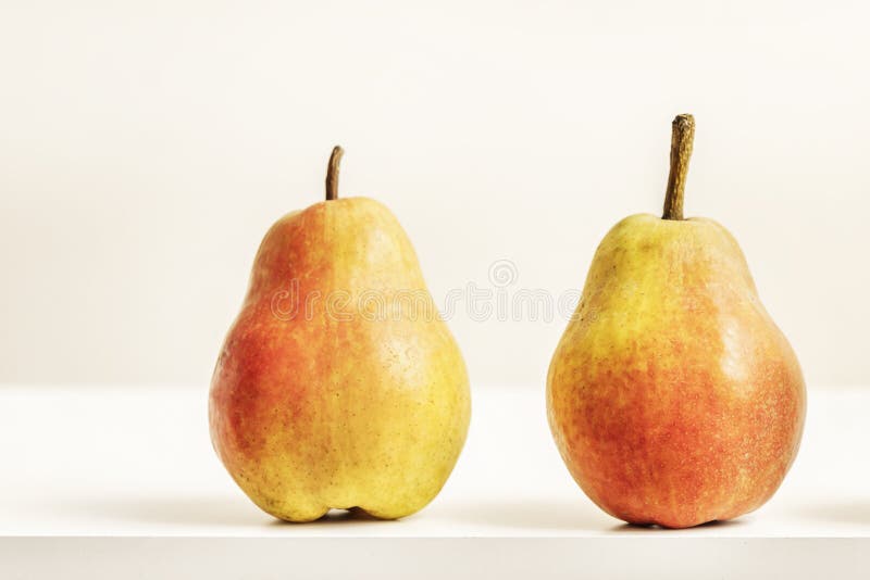 Two Delicious Ripe Pears on a White Surface Stock Image - Image of ...