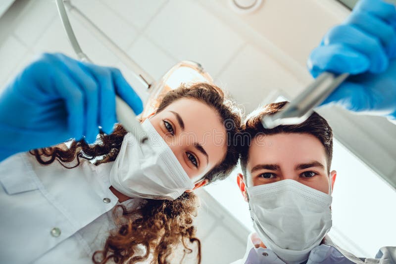 Two Dentists Examining Teeth, Patients Perspective. Close Up View Stock ...