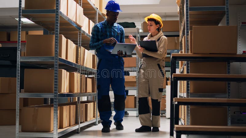 Two Depot Workers Doing Inventory for Warehouse Goods Stock Image ...