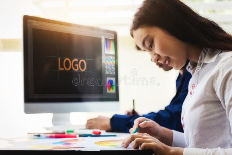 Two Designer Graphic Creative People Working about Website Design with ...