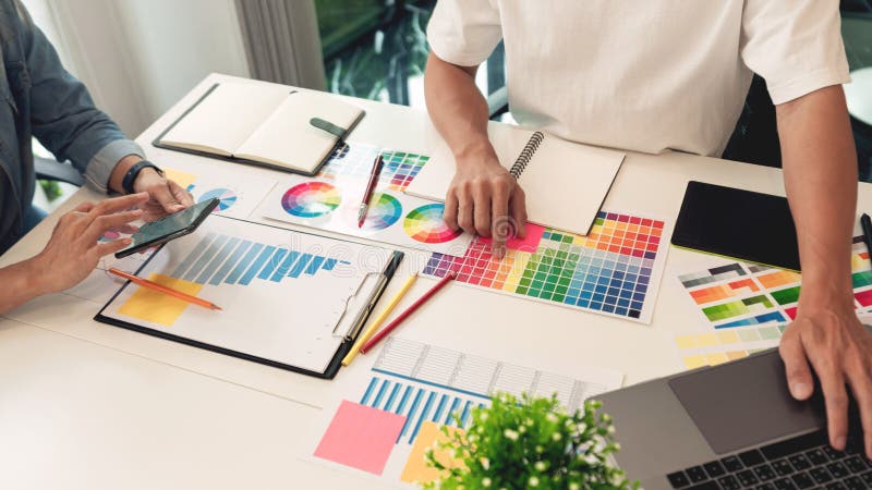 Two Designers Discussing on the Color Tone for the Excellent Visual ...