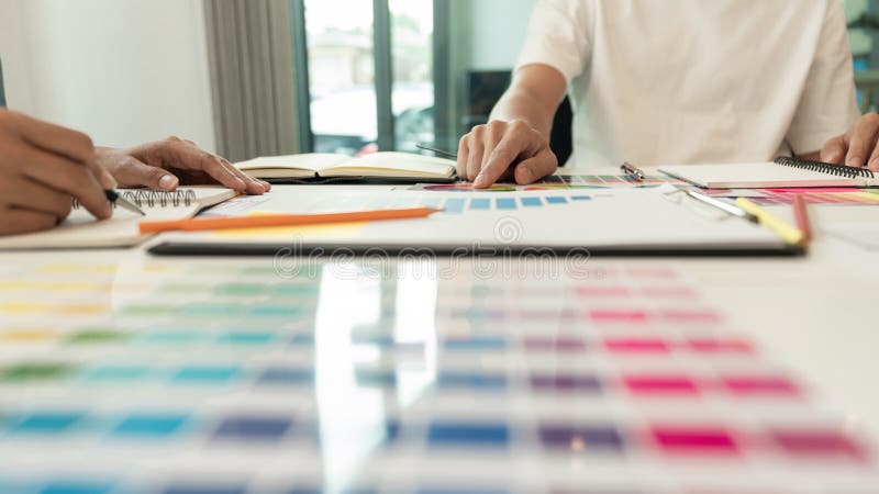 Two Designers Discussing on the Color Tone for the Excellent Visual ...