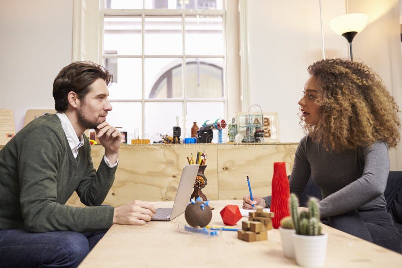 Two Designers Having Creative Meeting in Modern Office Stock Photo ...