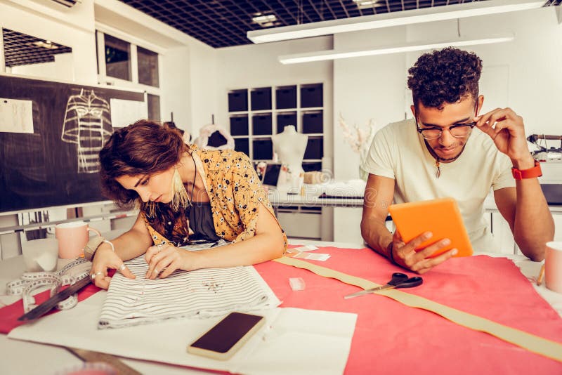 Two Designers in Process of Creating New Collection. Stock Photo ...