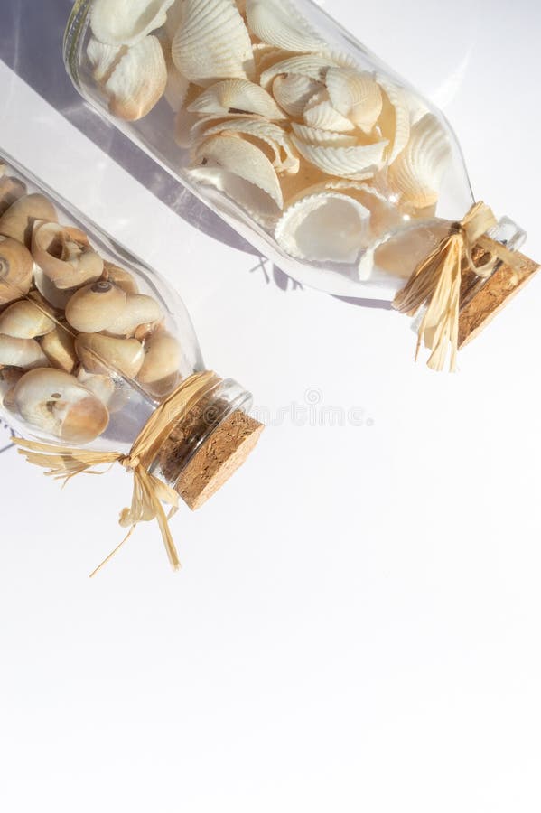 Image of Two Diagonal Glass Bottles Stock Image - Image of white ...