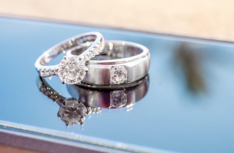 Two diamond wedding rings stock image. Image of together - 130773785