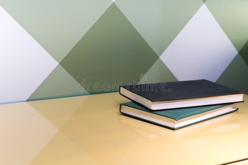 Two Diary Books on the Table Near Graphic Wall Stock Image - Image of ...