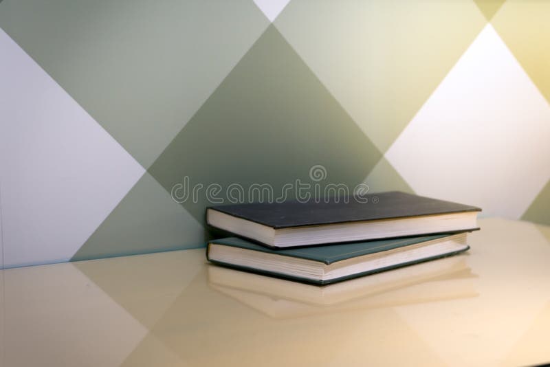 Two Diary Books on the Table Near Graphic Wall Stock Image - Image of ...