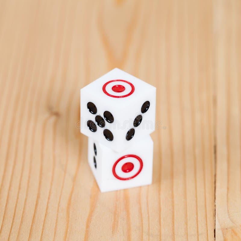 Two dice on wooden table stock image. Image of objects - 79584635