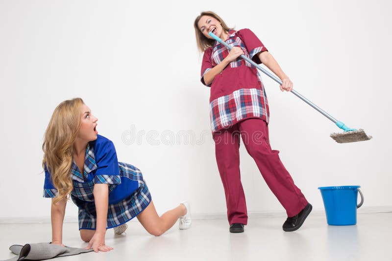 Two Different Cleaners Compete. Poor Staff Stock Image - Image of ...