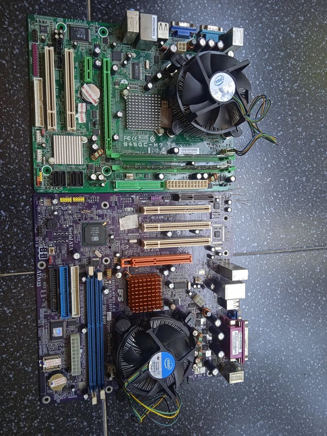Two Different Computer Motherboards, Featuring Different Designs ...