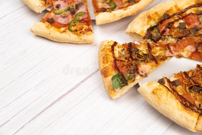 Two Different Delicious Large Pizzas on a Light Wooden Background Stock ...