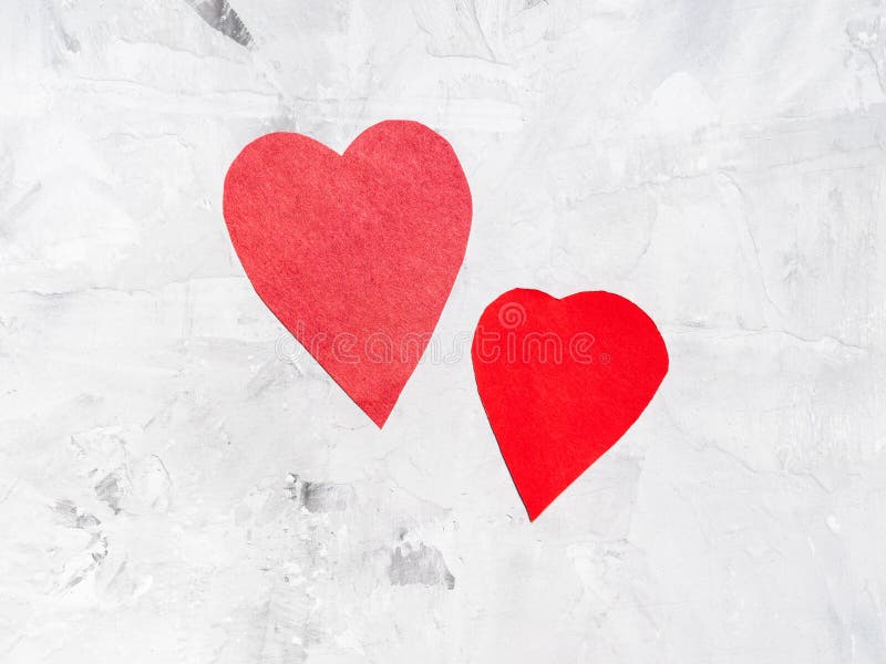 Two Different Hearts Cut from Red Paper on Gray Stock Photo - Image of ...