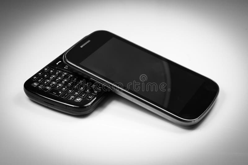 Two Different Phones, Two Different Ages, Black and White Stock Image ...