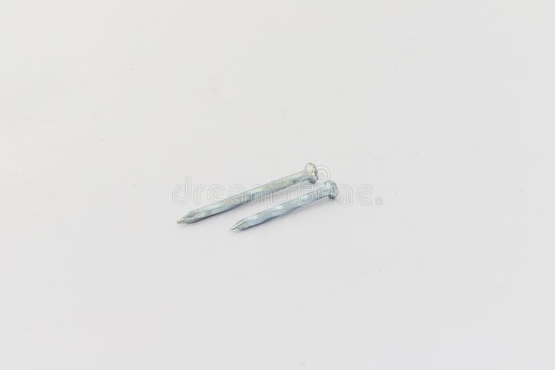 Two Different Sizes Galvanized Steel Nails on a White Background Stock ...