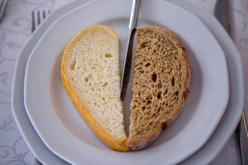 Two Different Slices of Bread on a Plate Stock Photo - Image of still ...