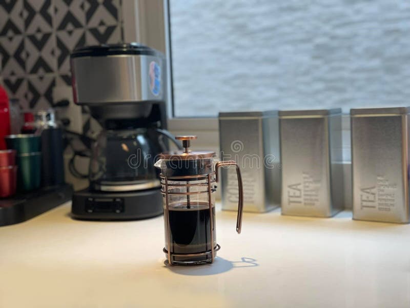 Two Different Types of Coffee Makers Isolated with Blurred Stock Photo ... Two Different Types of Coffee Makers Isolated with Blurred Stock Photo ...