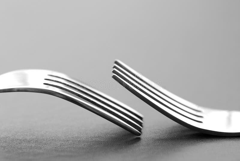 Two dining forks stock image. Image of black, form, backdrop - 12470527
