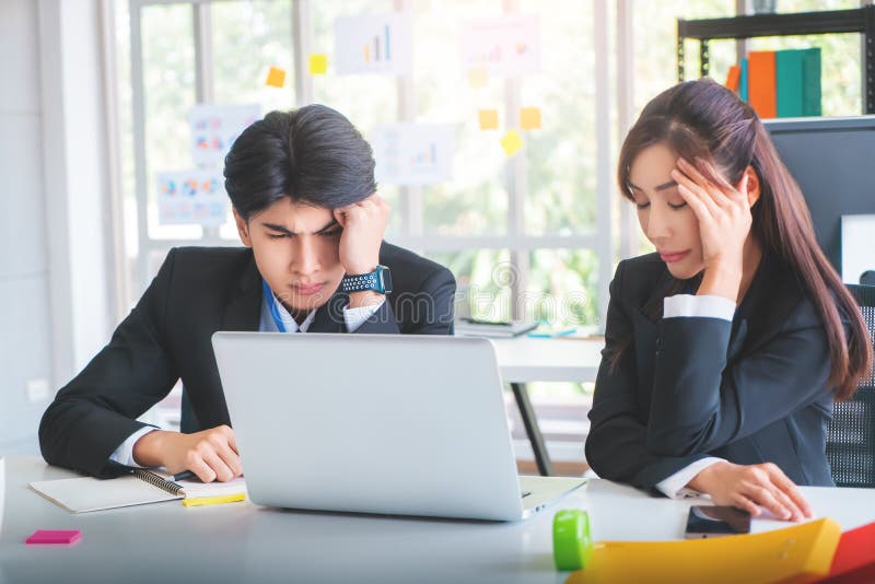 Two Disappointed Business Person Looking at Computer Screen with Upset ...