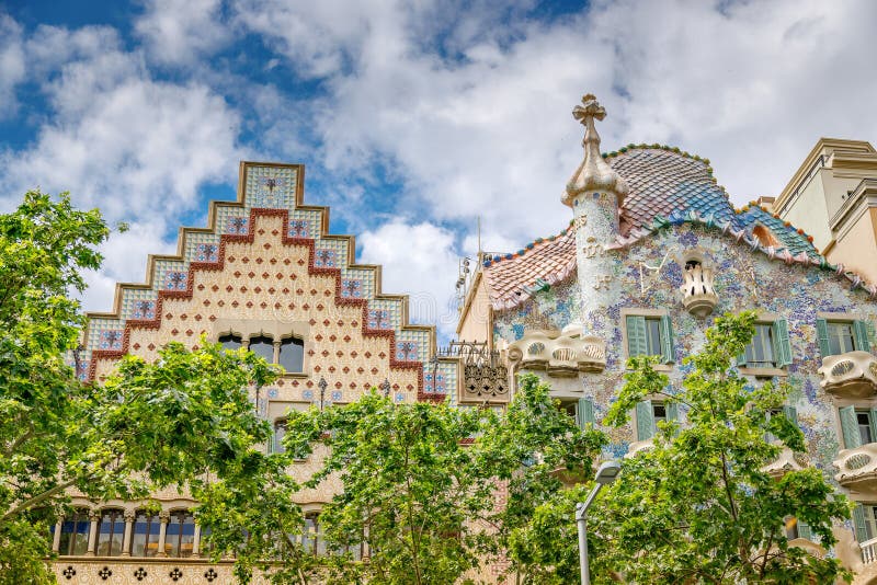 Two Distinct and Architecturally Unique Buildings, Partially Obscured ...