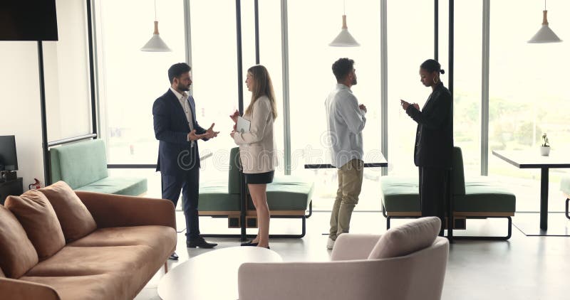 Two Diverse Business Couples Standing, Talking in Modern Co-working ...