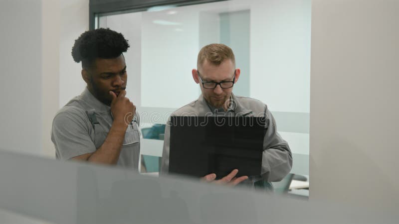 Installers Sets Up Security Cameras in Office Stock Image - Image of ...