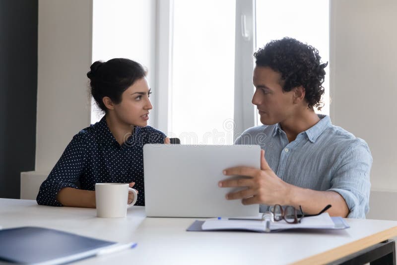 Two Diverse Team Coworkers Sharing Computer at Workplace Stock Image ...