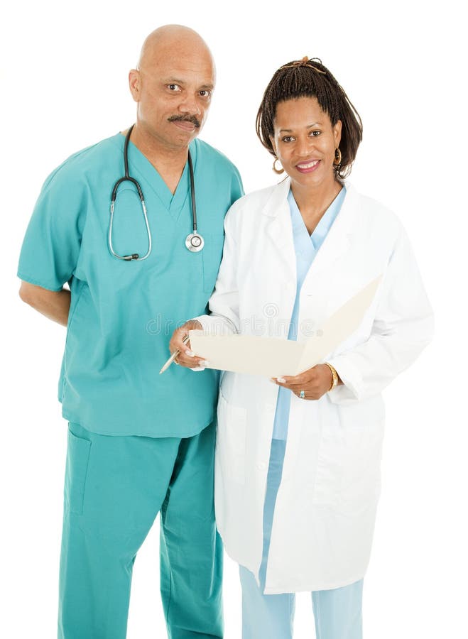 Smiling Doctors with Chart stock photo. Image of person - 1078704