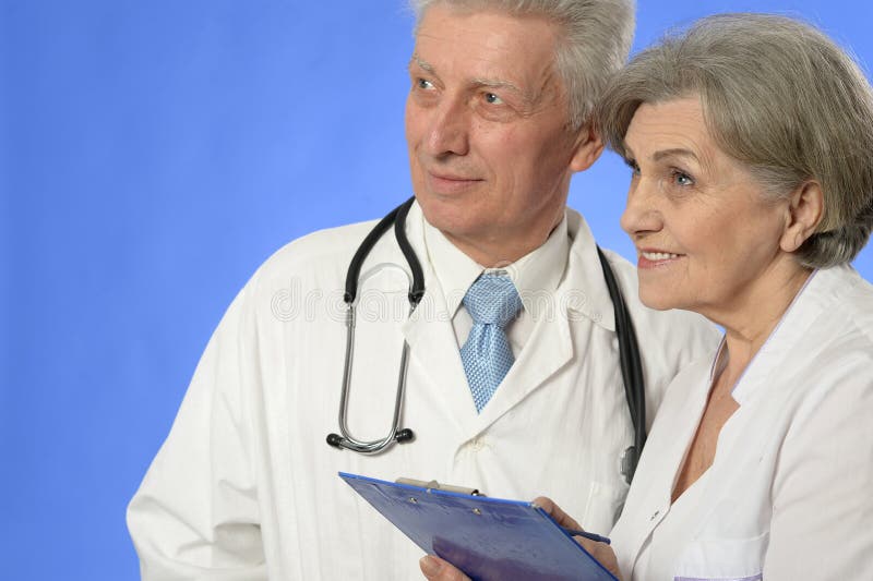 Two doctors on blue stock photo. Image of human, healthy - 40006746