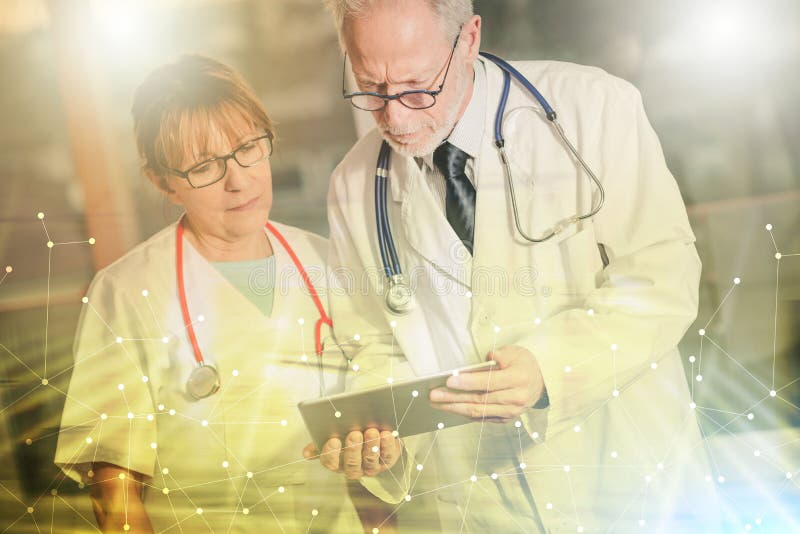 Two Doctors Discussing about Medical Report on Tablet; Multiple ... Two Doctors Discussing about Medical Report on Tablet; Multiple ...
