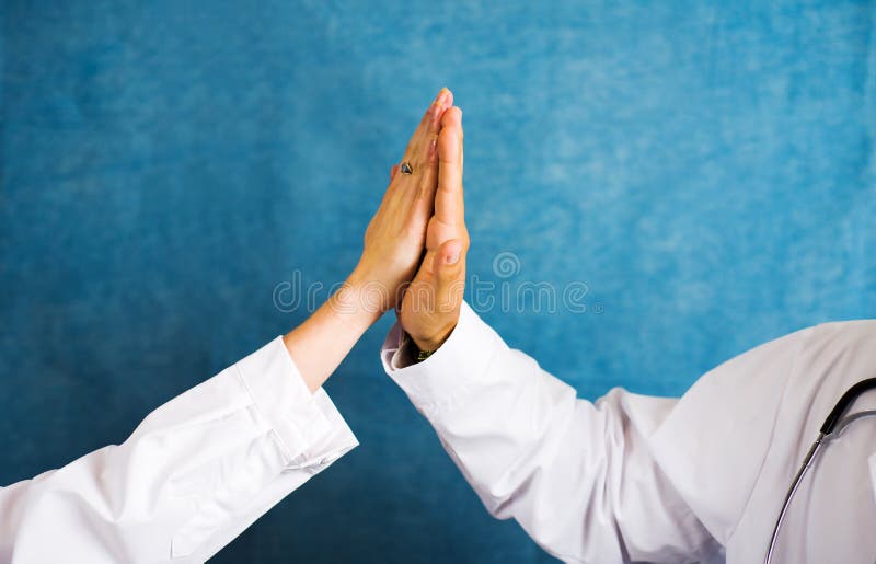 Two Doctors Doing High Five Close Up Stock Image - Image of high ...