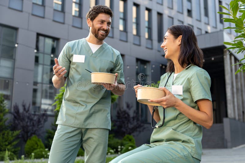 Two Doctors Having Lunch Together in the Clinic Yard Stock Image ...