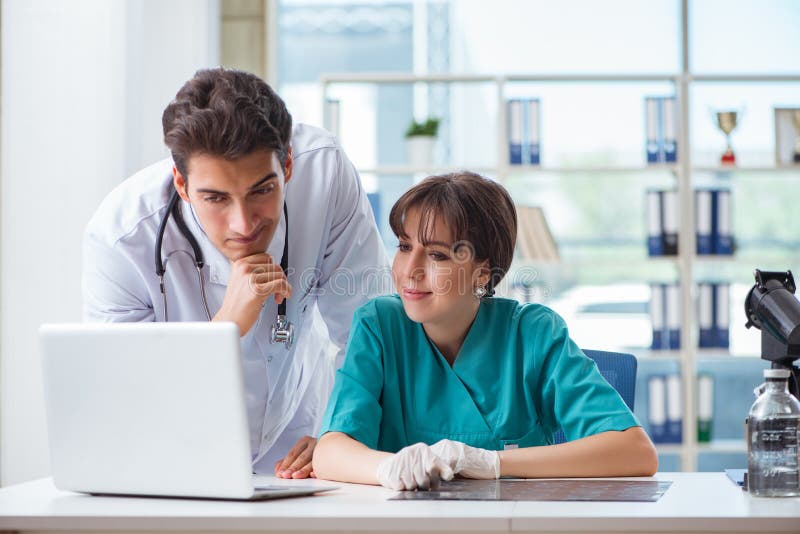 The Two Doctors in the Hospital Stock Photo - Image of medic, coach ...
