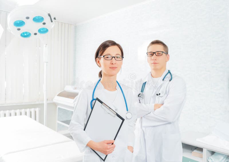 Friendly Doctor in Hospital Stock Photo - Image of happy, confident ...