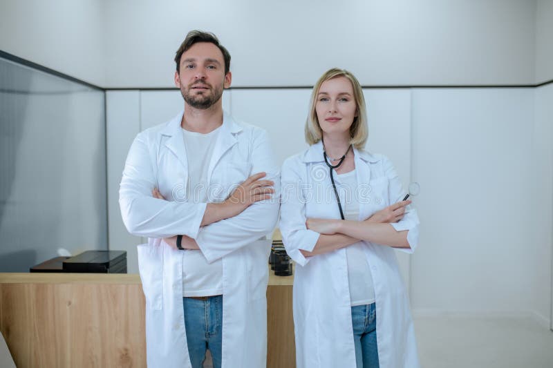 Two Doctors in Lab Coats in the Clinic Stock Image - Image of ...