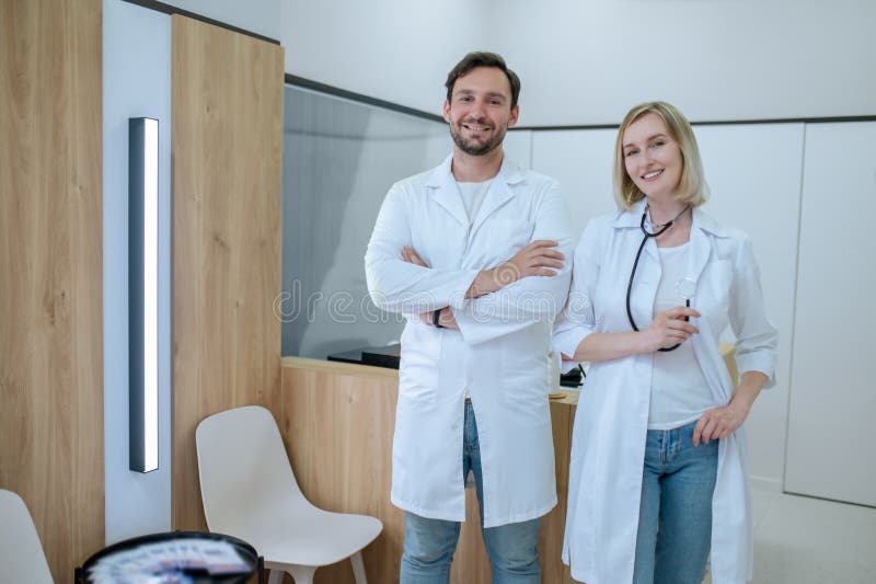 Two Doctors in Lab Coats in the Clinic Stock Image - Image of indoors ...