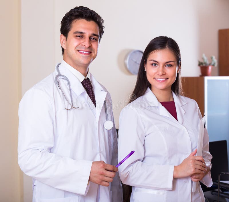 Two Doctors In Private Clinic Stock Image - Image of clinic, doctor ...