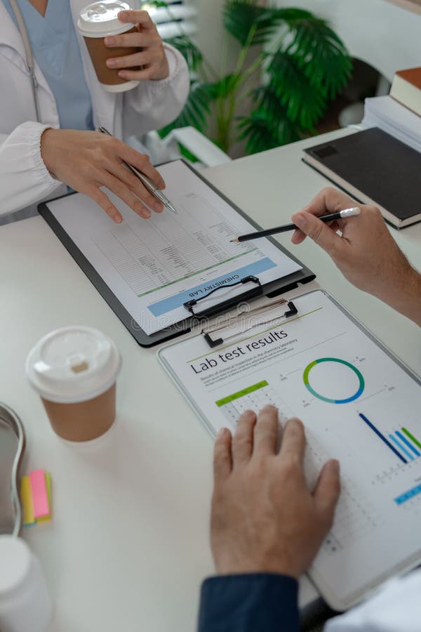 Two Doctors Sat in a Private Office at the Hospital Discussing and ...