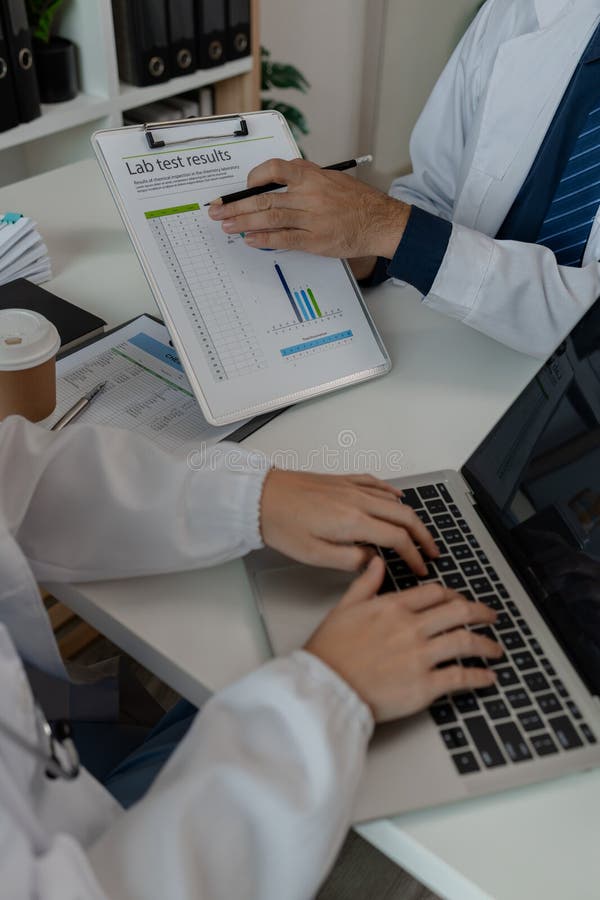 Two Doctors Sat in a Private Office at the Hospital Discussing and ...