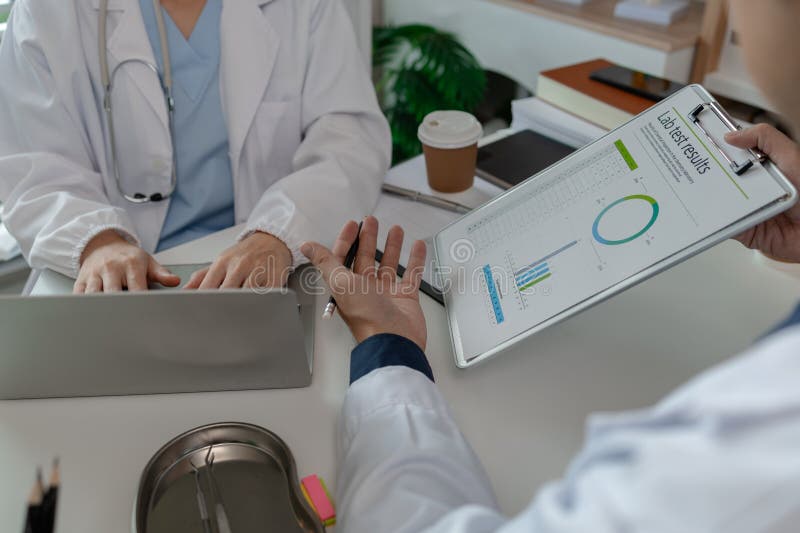 Two Doctors Sat in a Private Office at the Hospital Discussing and ...