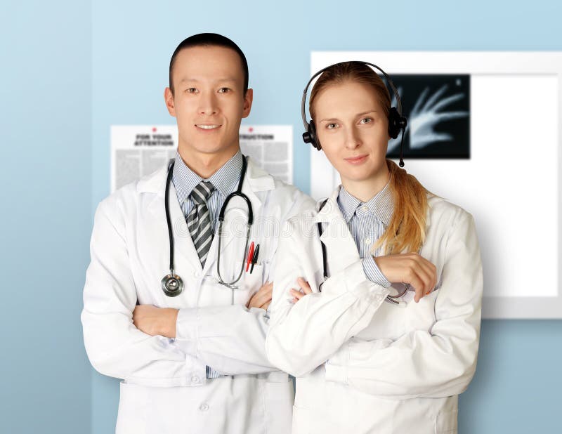 Two Doctors Smiles at Camera Stock Image - Image of medicine, health ...